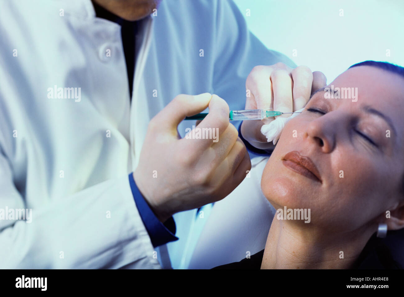 Woman having neurotoxin injection Stock Photo - Alamy