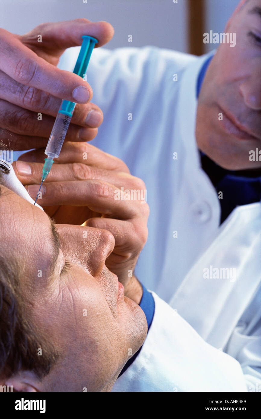 Man having neurotoxin injection Stock Photo - Alamy