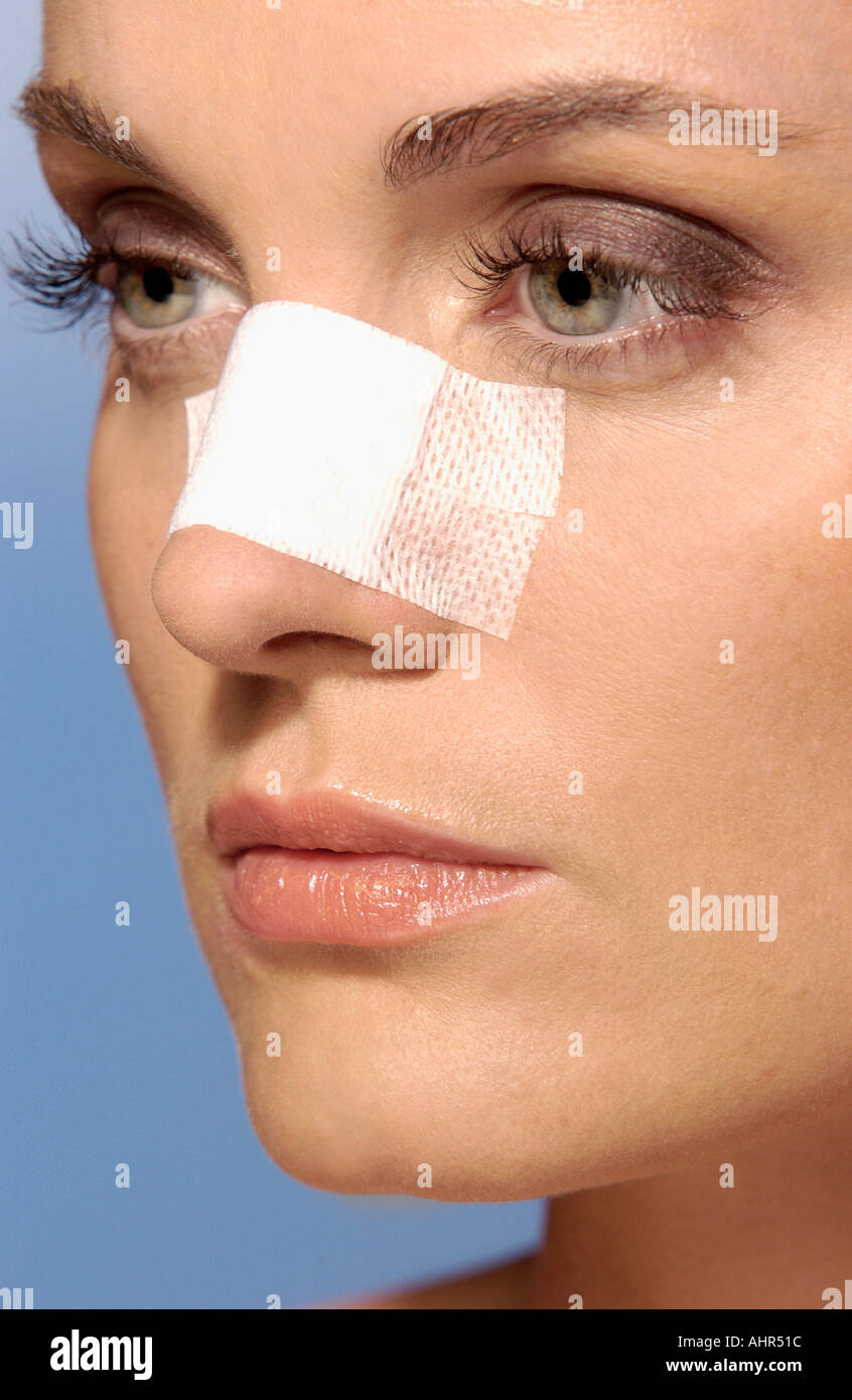 Woman wearing surgical face hi-res stock photography and images - Alamy