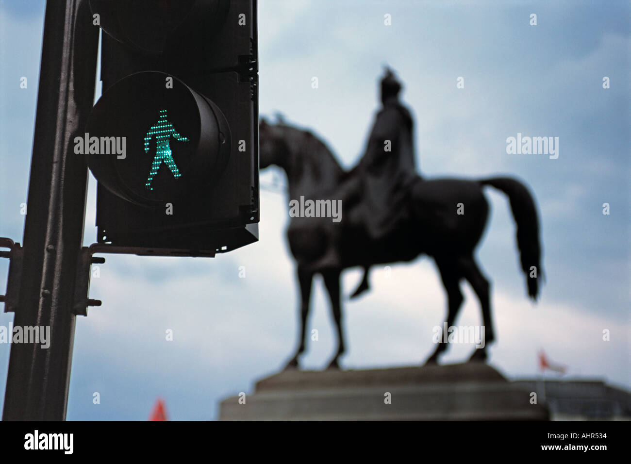 Pedestrian crossing and statue Stock Photo - Alamy