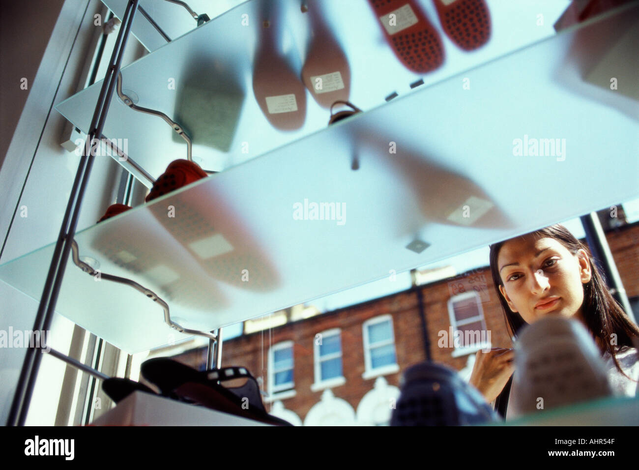 Woman window shopping temptation window hi-res stock photography and ...