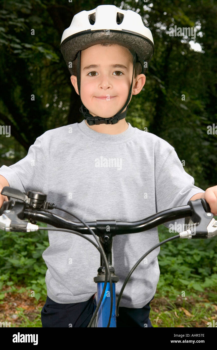 Portrait of a boy learning to ride his bike Stock Photo - Alamy