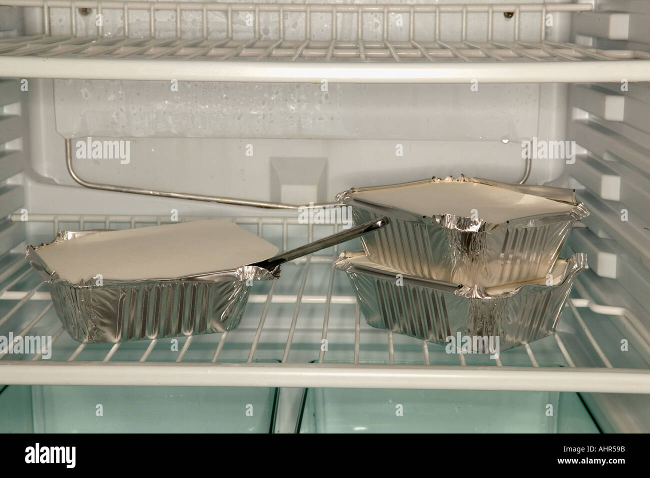 Fast food containers in refrigerator Stock Photo - Alamy