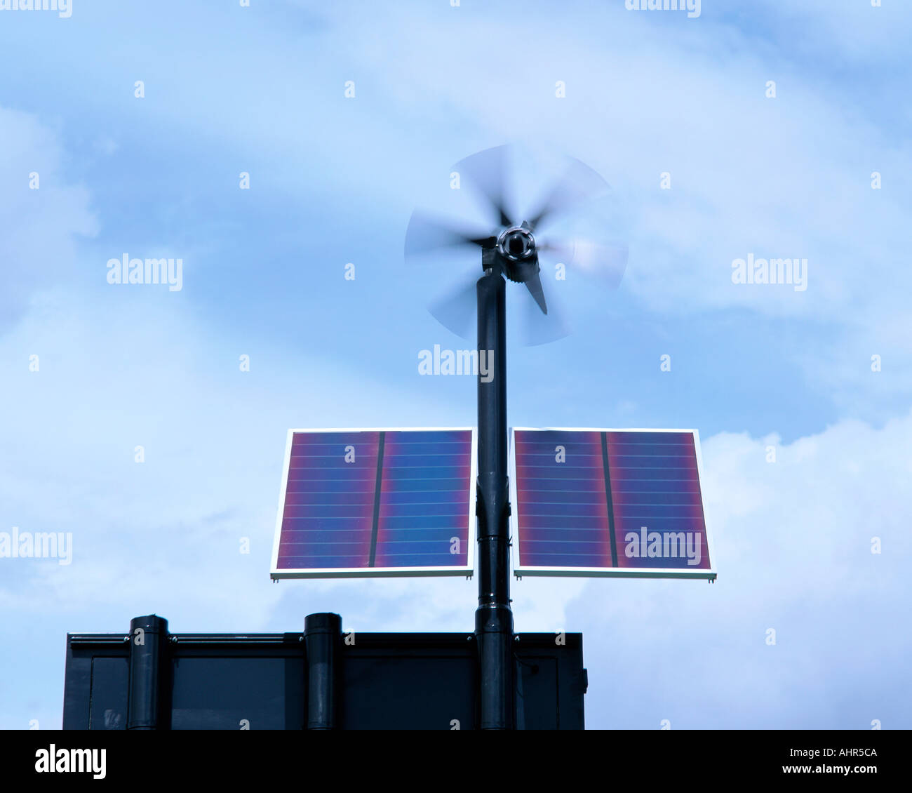 Windmill and solar panel Stock Photo - Alamy