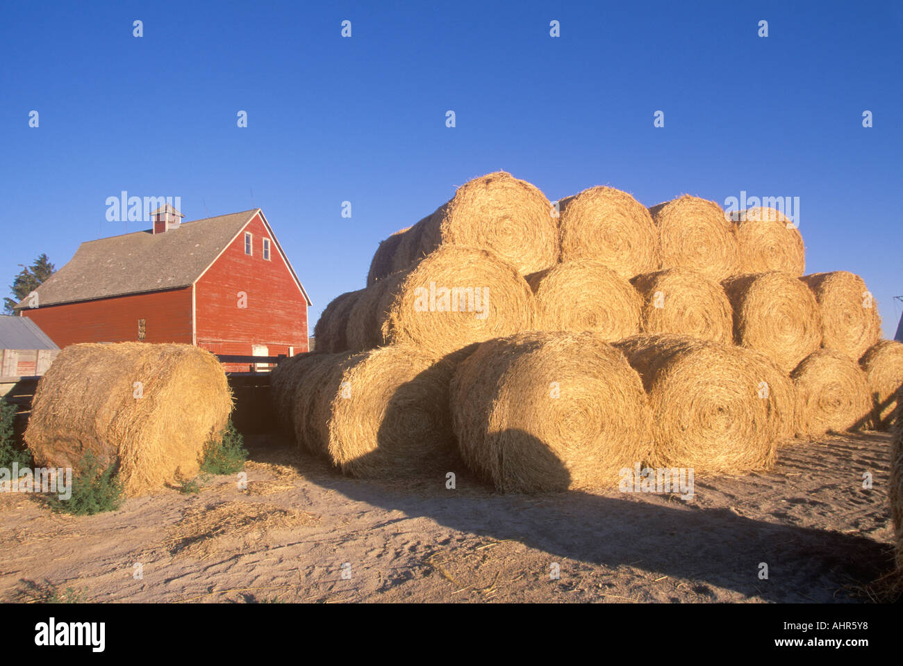 Red barn and haystacks in ID Falls Stock Photo - Alamy