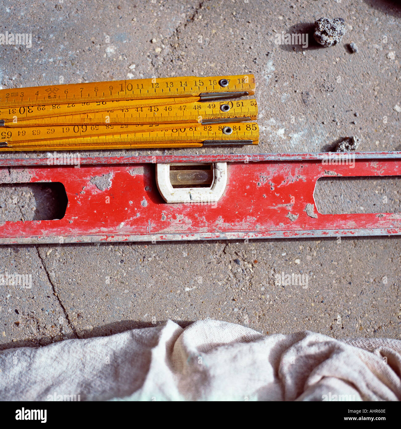 Tape measure and spirit level Stock Photo - Alamy