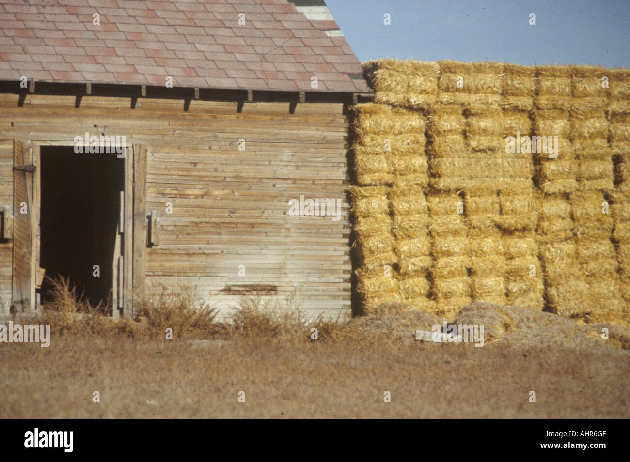 Haystacks next to an old barn in Southern UT Stock Photo - Alamy