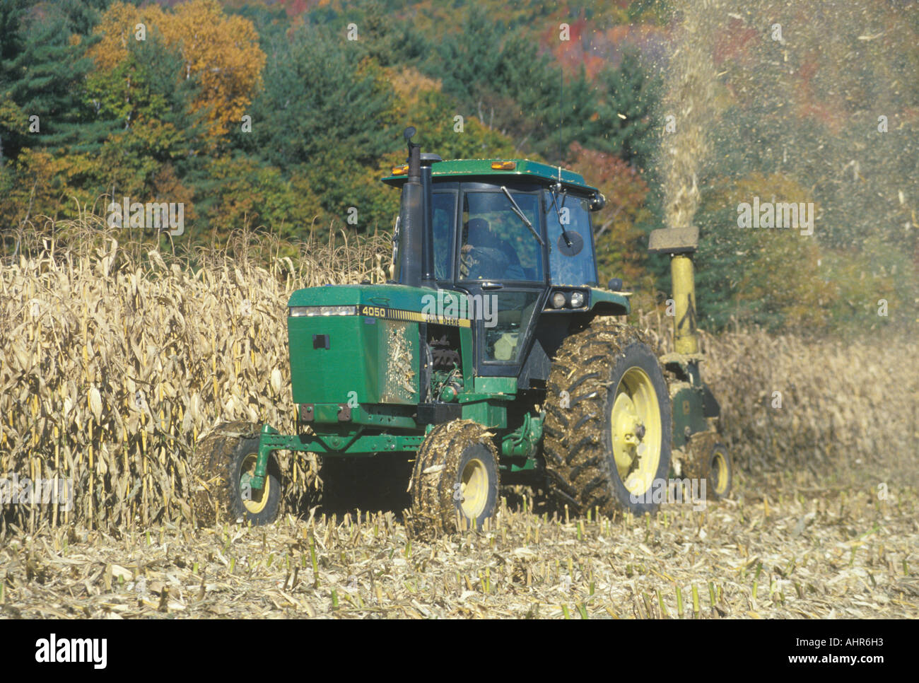 Farmer cutting corn with tractor in New England Stock Photo - Alamy