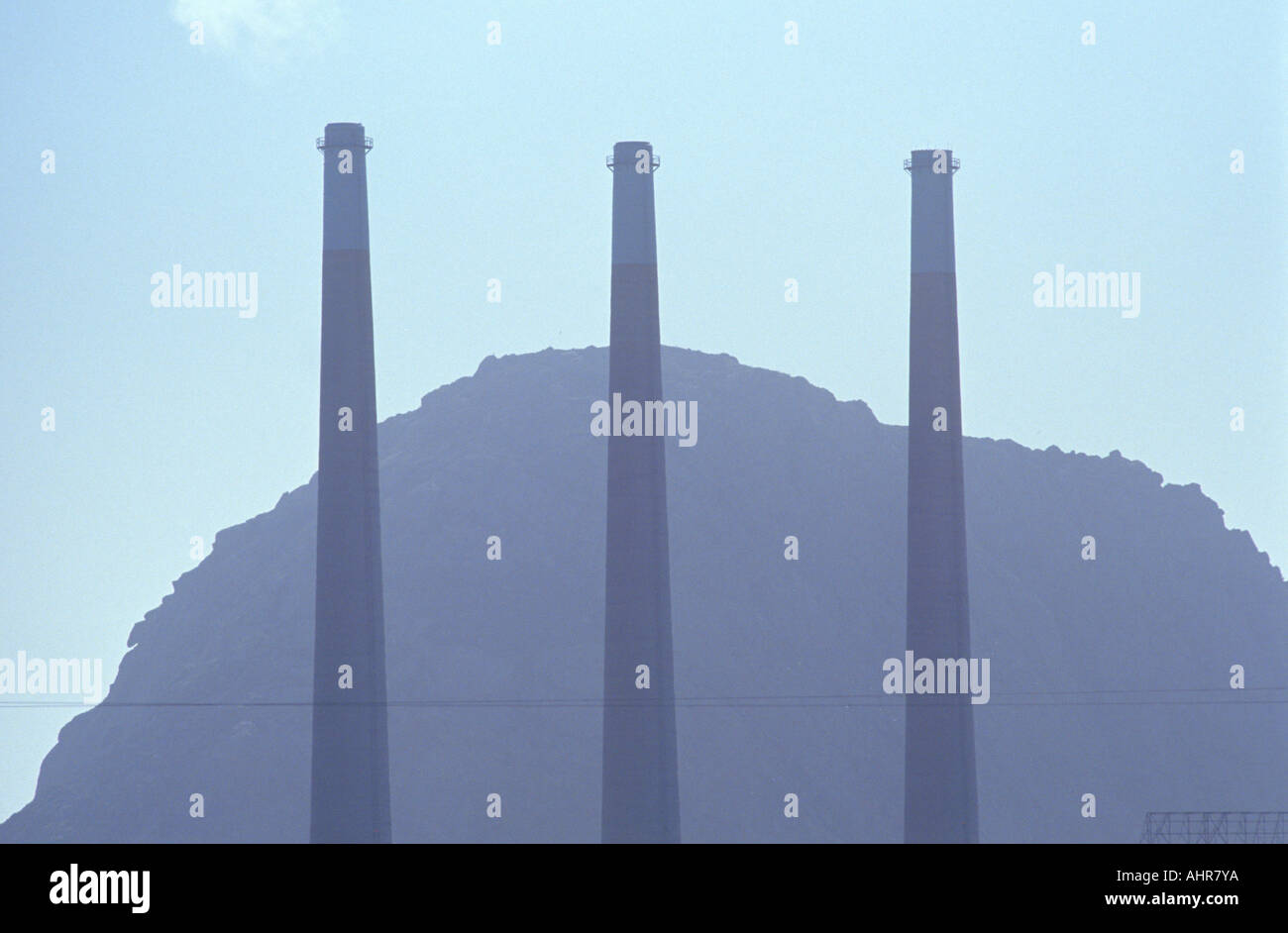 Three smoke stacks at a utility plant in Morro Bay California Stock ...