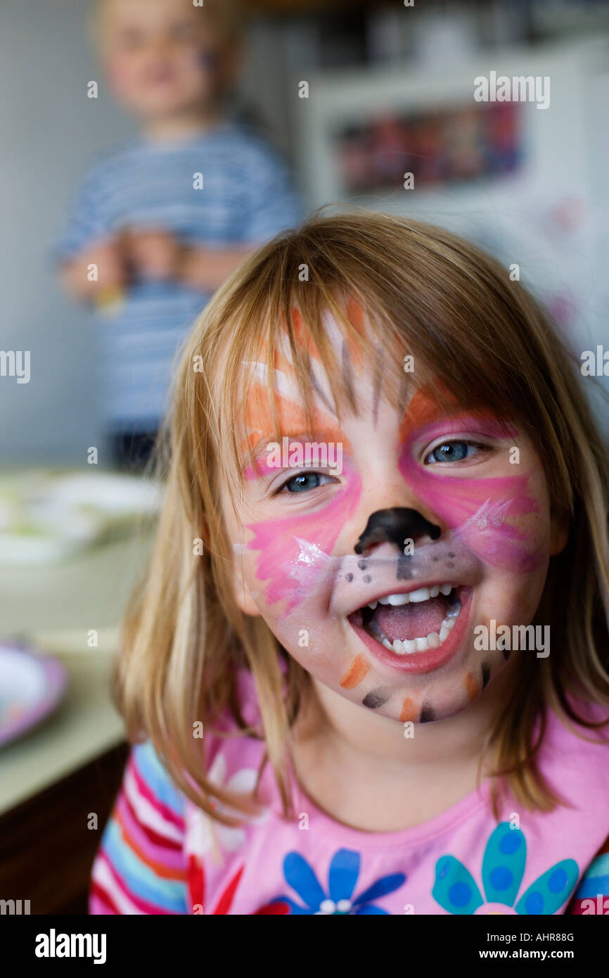 portrait of girl laughing with face paint Stock Photo - Alamy