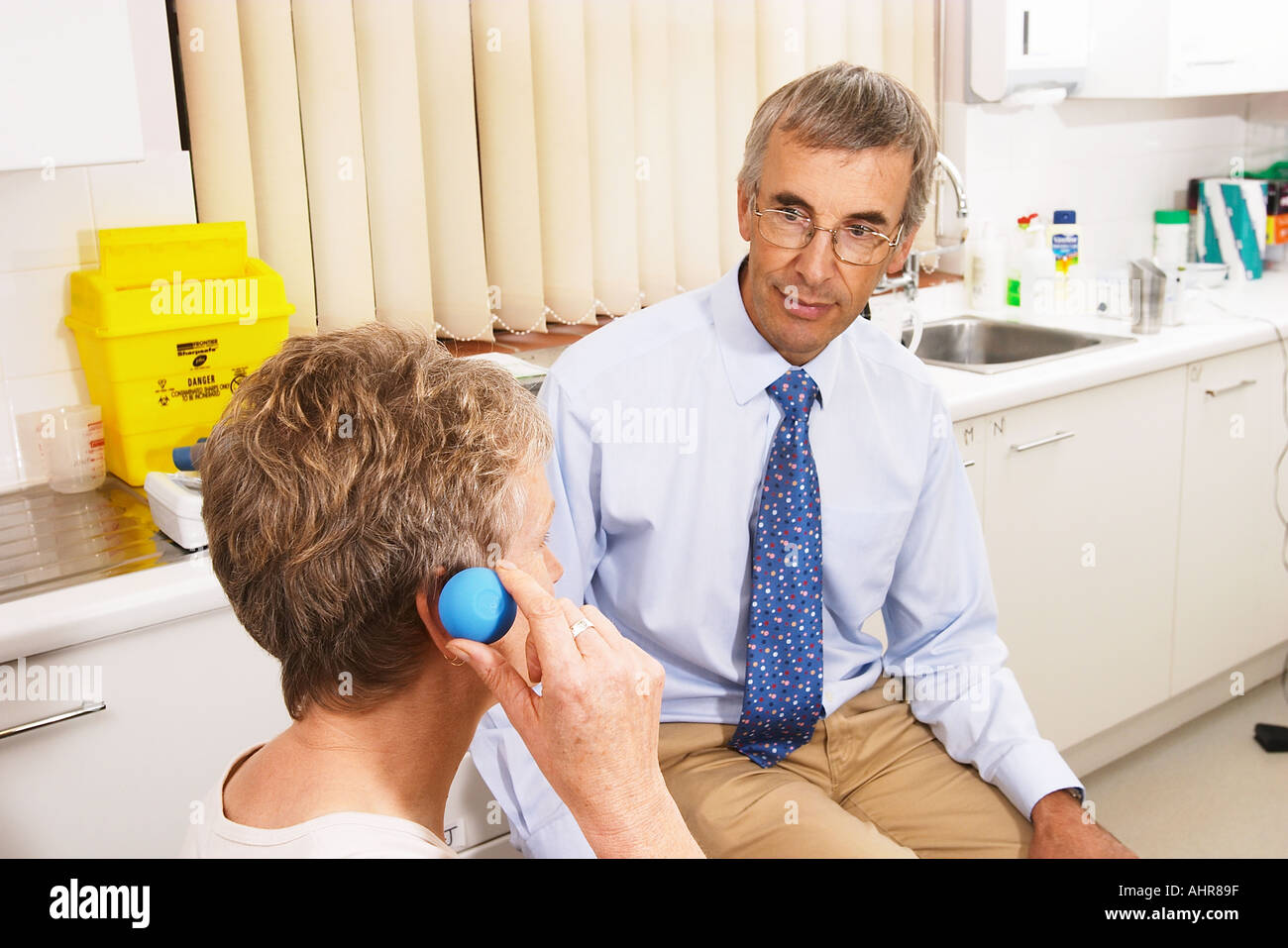Dr Richard Coppin Overton Hants with DIY Ear Syringer Stock Photo - Alamy