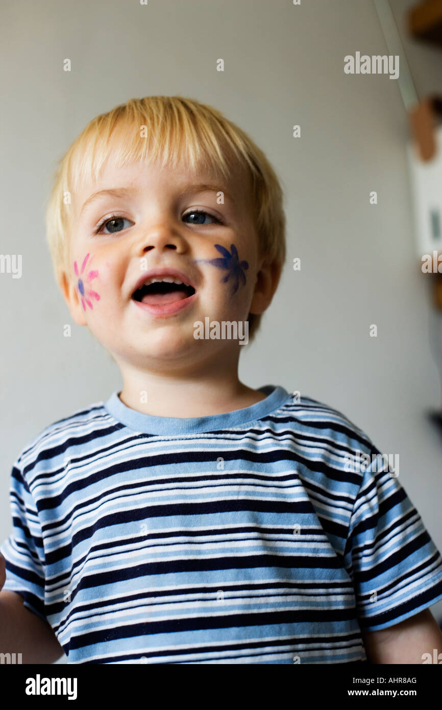 portrait of boy laughing with face paint Stock Photo - Alamy
