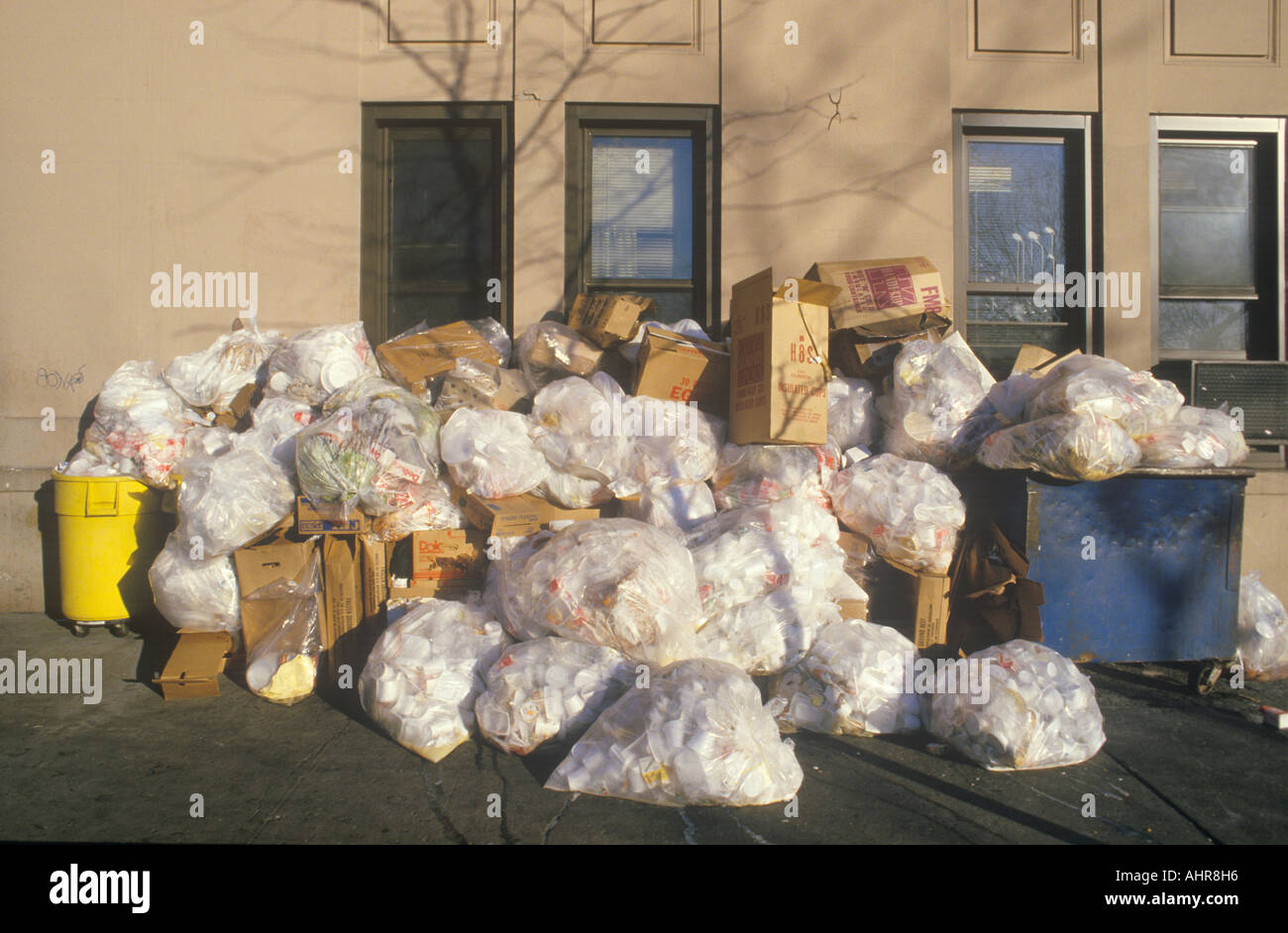 Trash pile against a building in New York City Stock Photo - Alamy