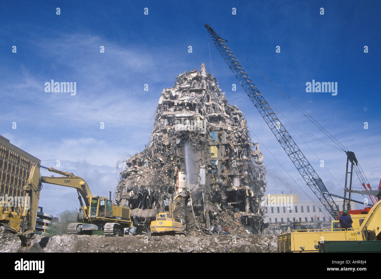 A demolition crew tearing down remnants from a building in Minneapolis ...