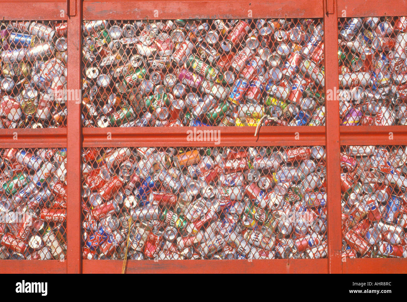 A recycling bin full of cans waiting for processing Stock Photo - Alamy