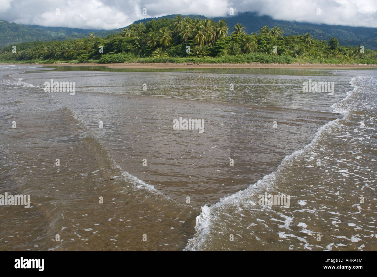 Tide coming in on an abandoned tropical beach at Parque Nacional Marino ...