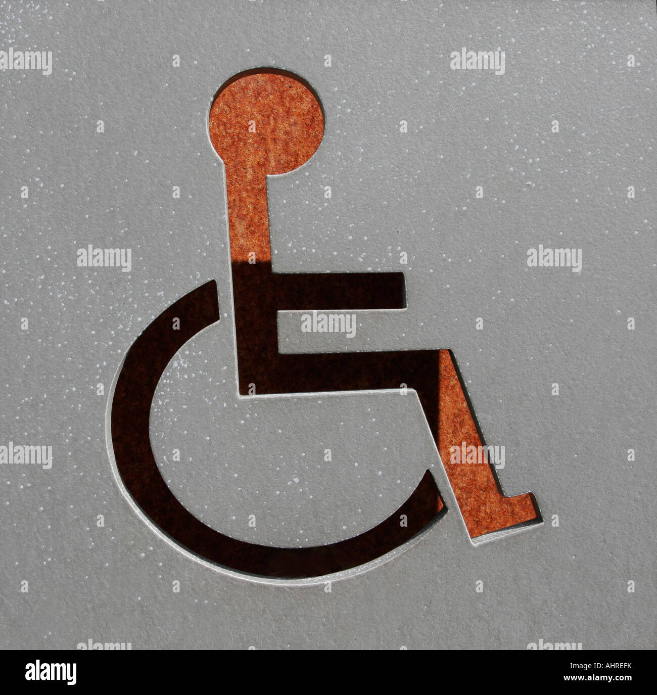Metal cutout wheelchair access sign Stock Photo - Alamy