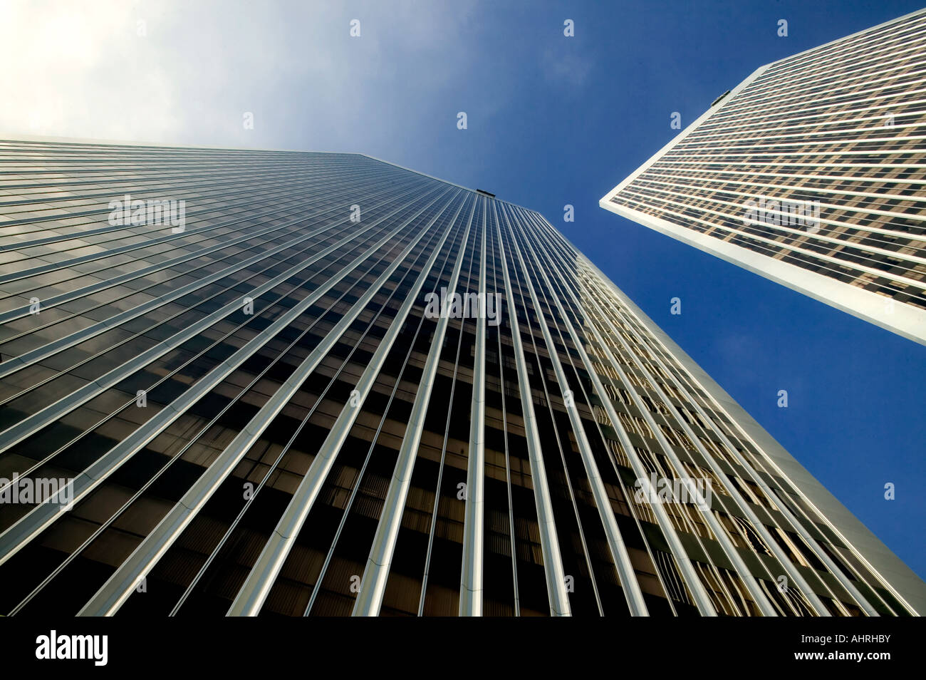 looking up at two high rise bulidings from the ground floor Stock Photo ...