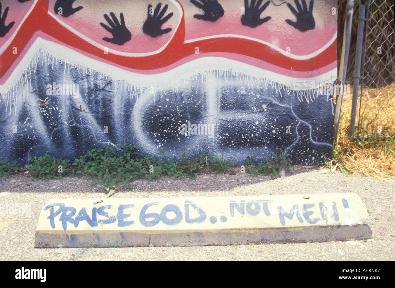 Graffiti reading Praise God not men South Central Los Angeles ...
