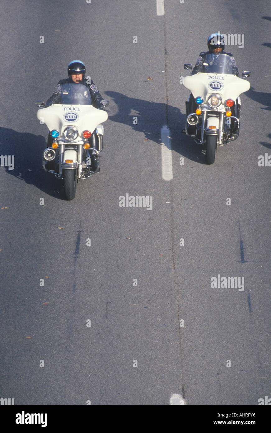 Motorcycle police officers riding on freeway Washington D C Stock Photo ...