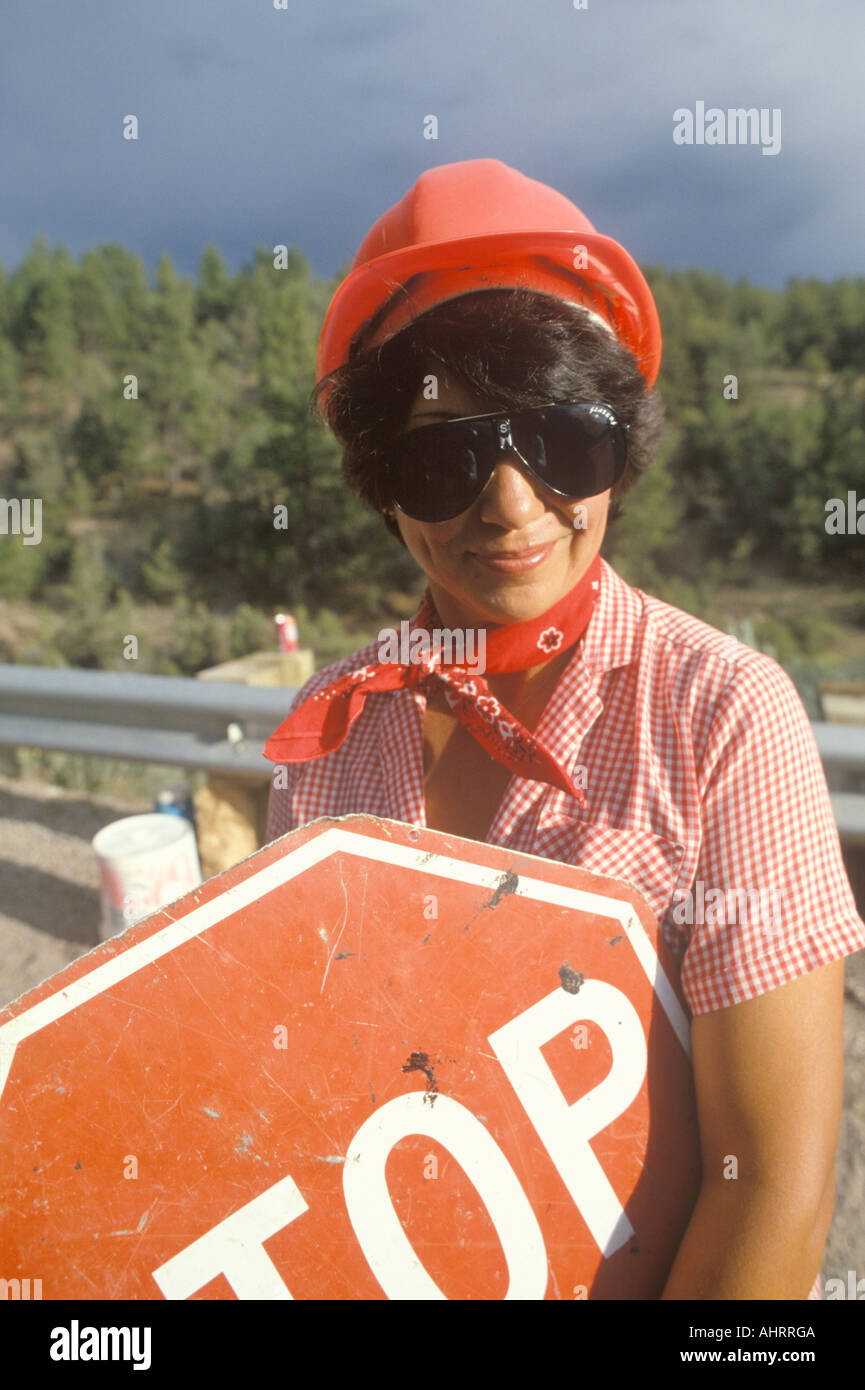 Female crossing guard with stop sign Stock Photo - Alamy