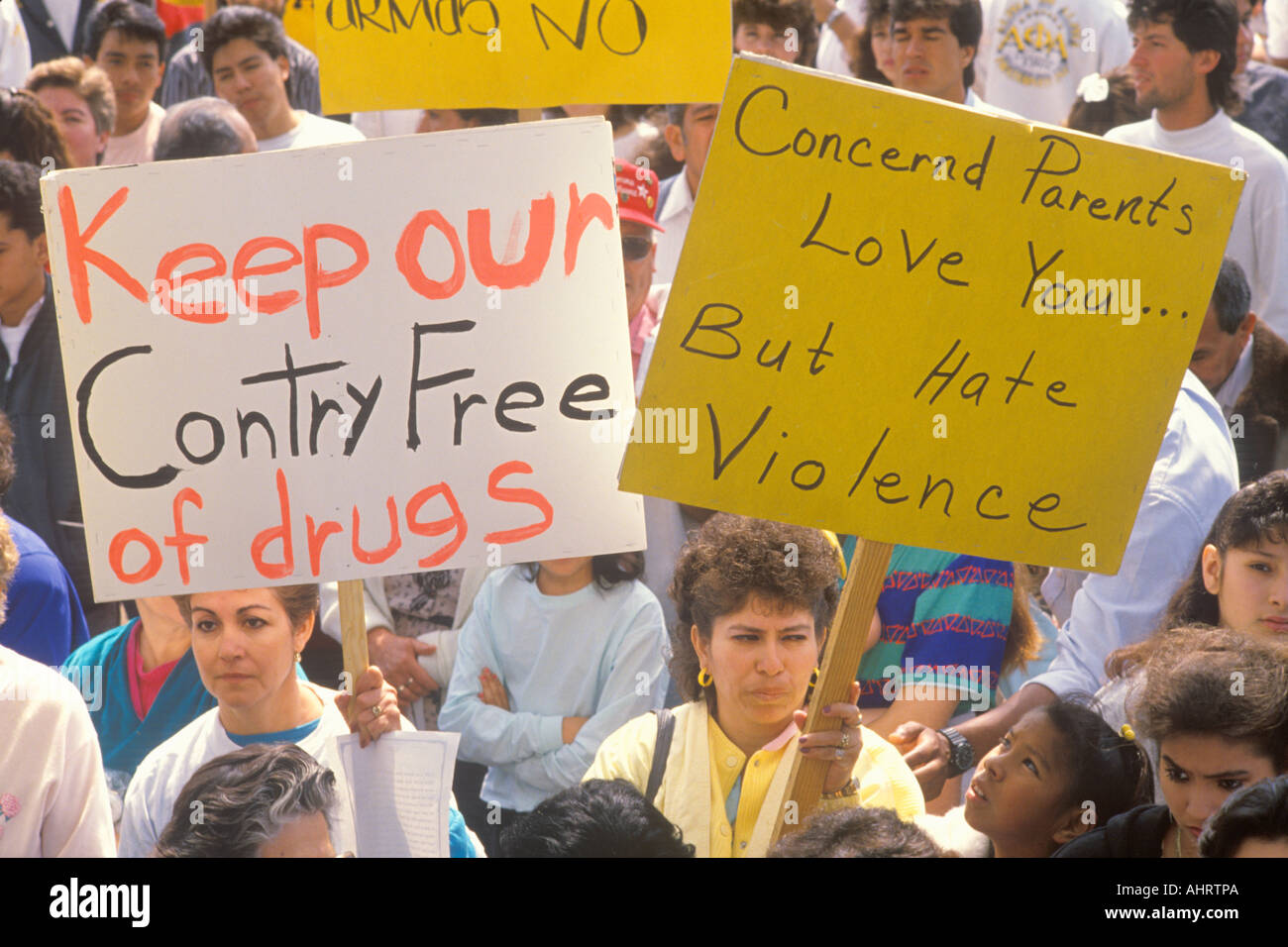Mothers holding signs at anti gang community march East Los Angeles ...