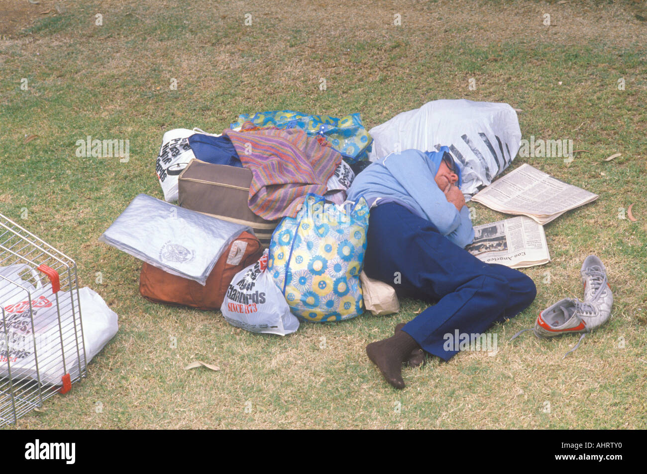 Homeless woman cart hi-res stock photography and images - Alamy