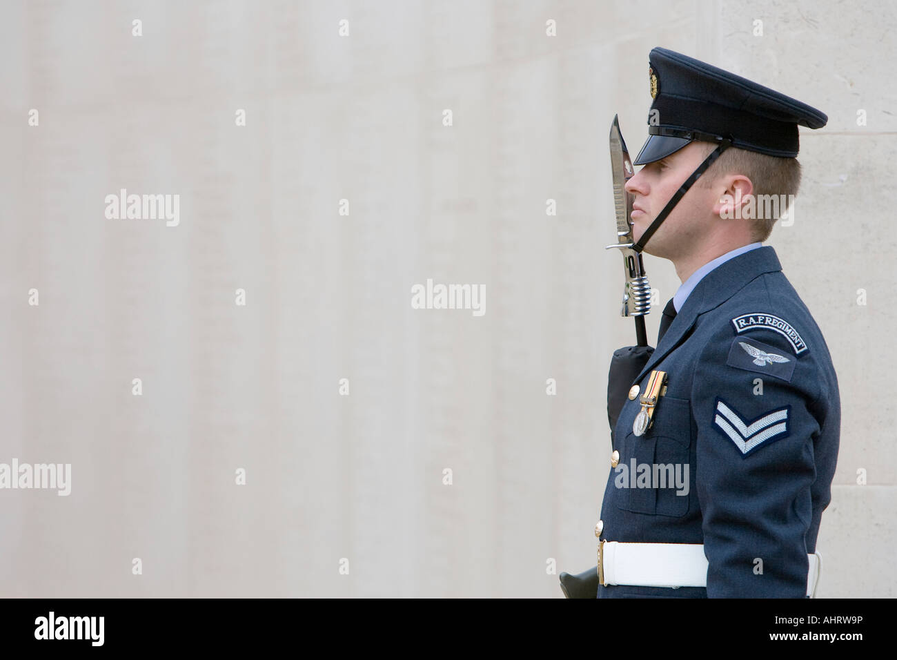 A soldier in the RAF regiment stands guard at the Armed Forces Memorial ...