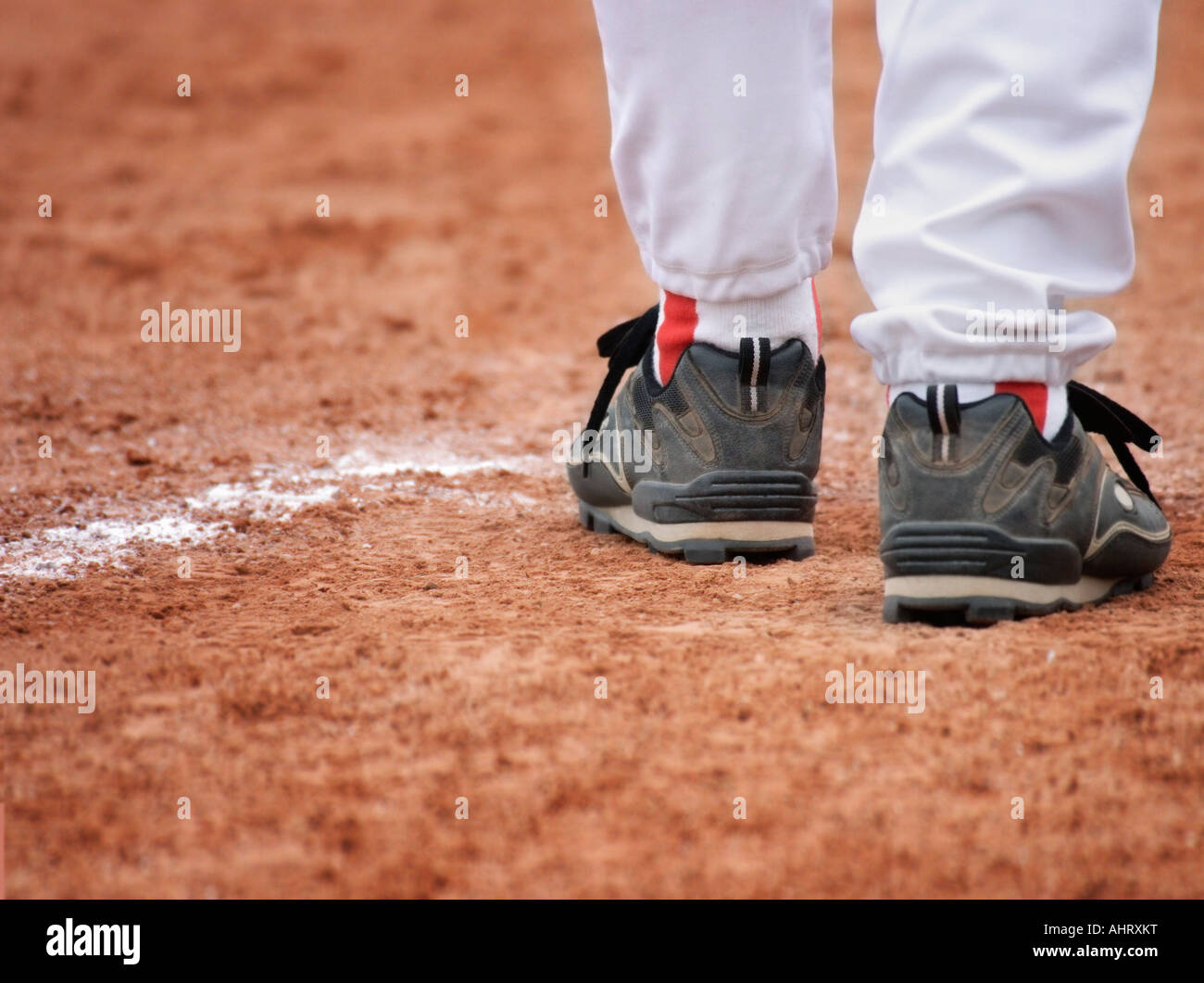 Person wearing baseball shoes Stock Photo - Alamy