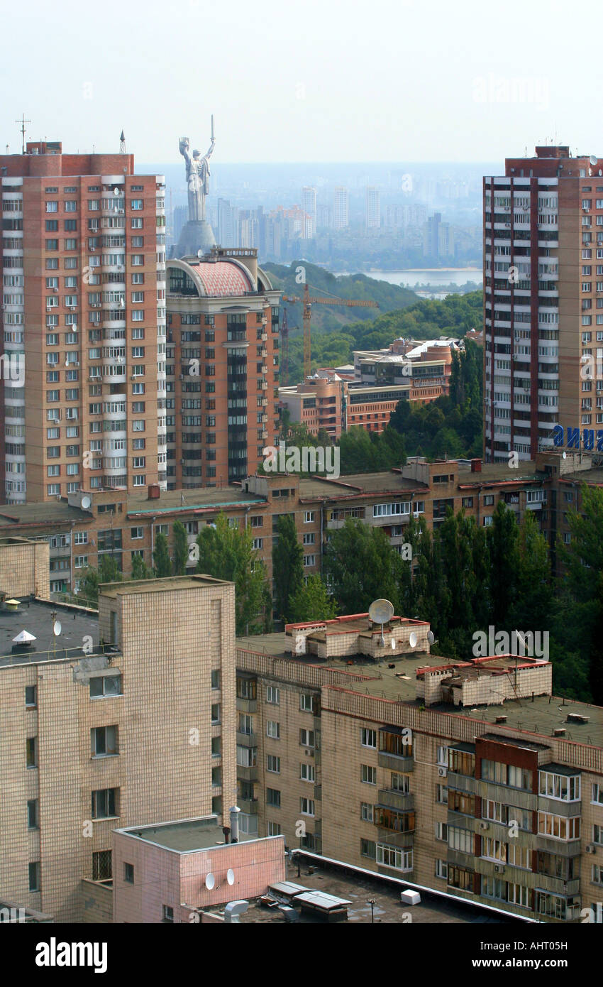 Urban skyline of Kyiv with residential buildings, lush greenery, and ...