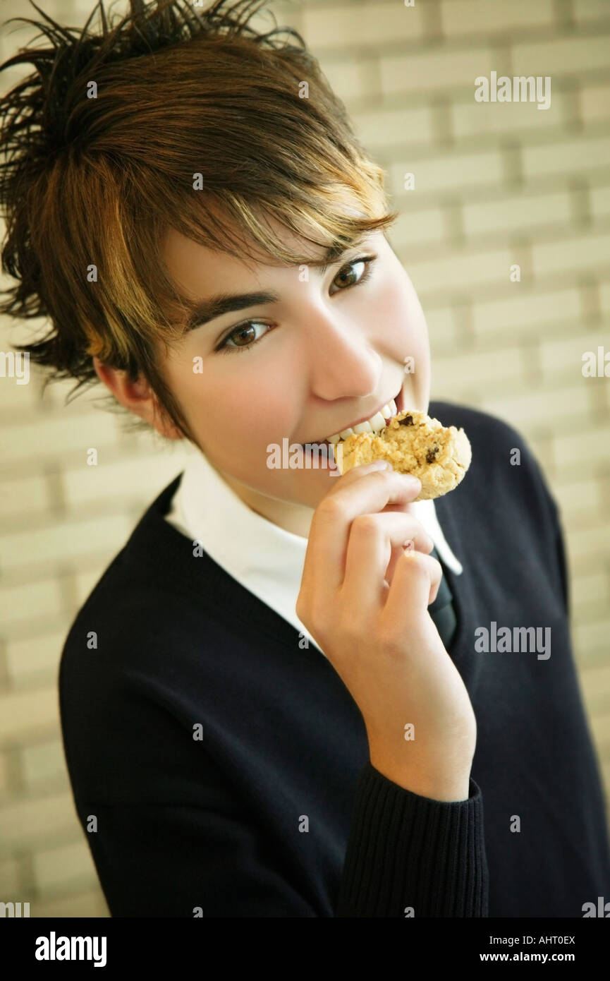 Eating a cookie Stock Photo - Alamy
