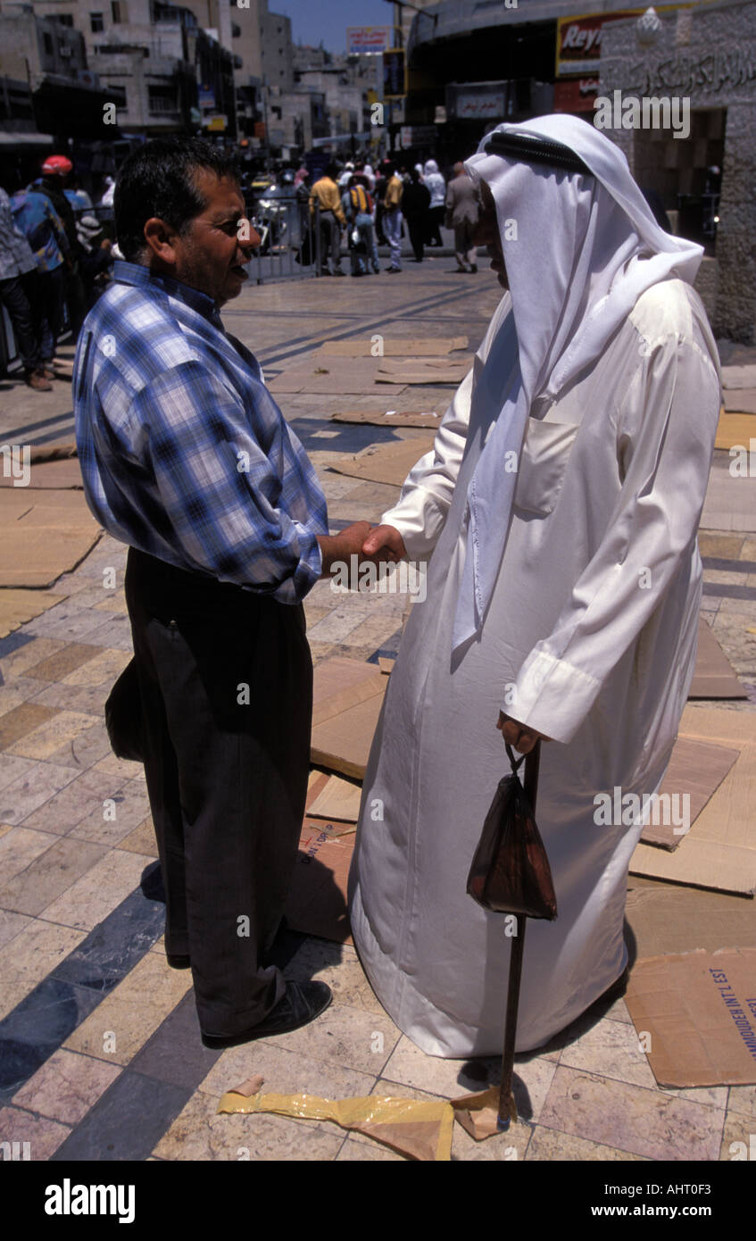 Two arab men greeting hi-res stock photography and images - Alamy