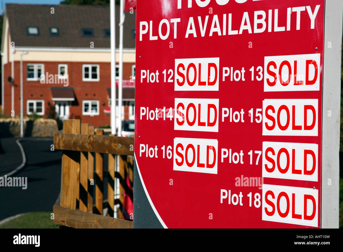 plots all sold sign with the house development in the background ...
