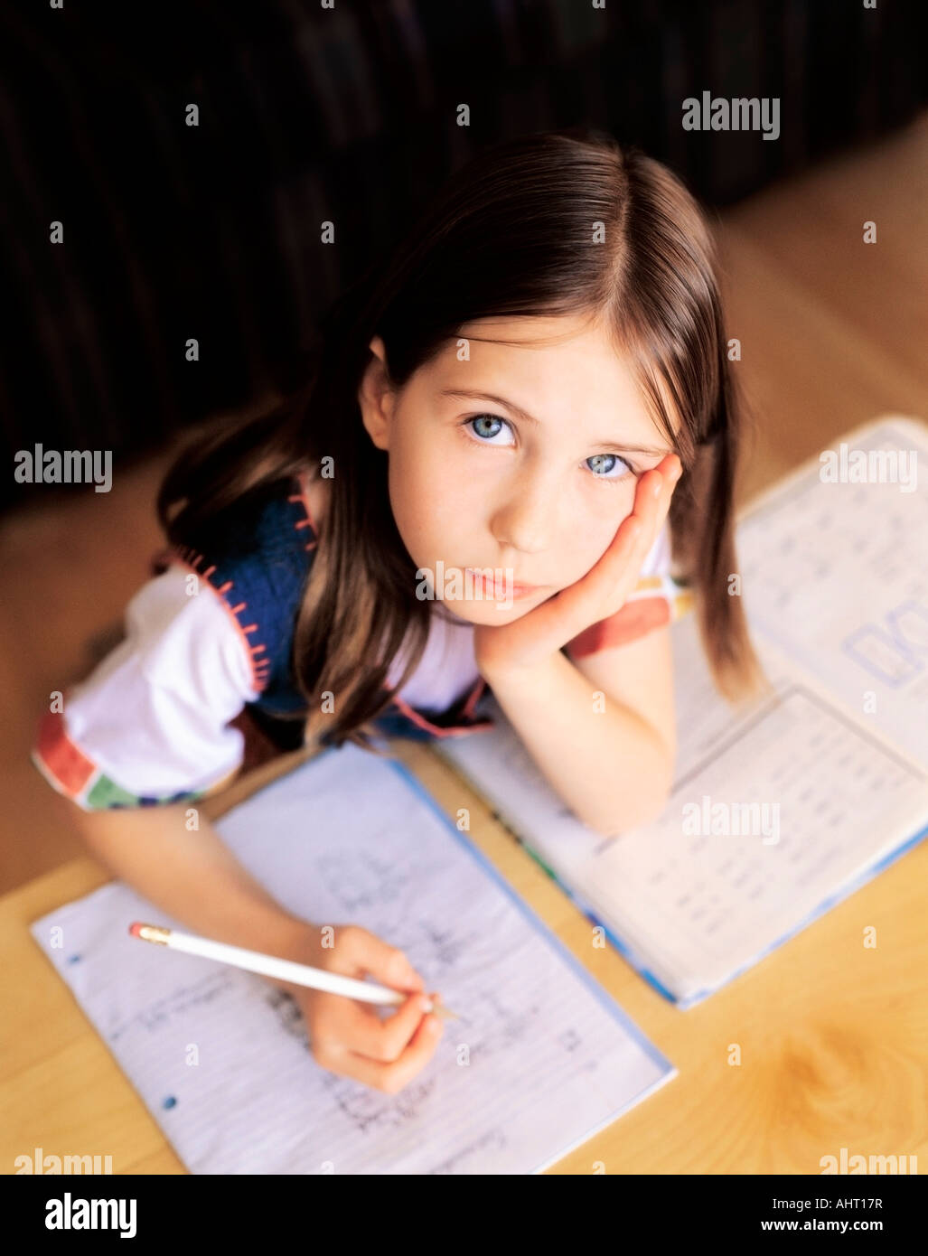 Little girl doing homework Stock Photo - Alamy