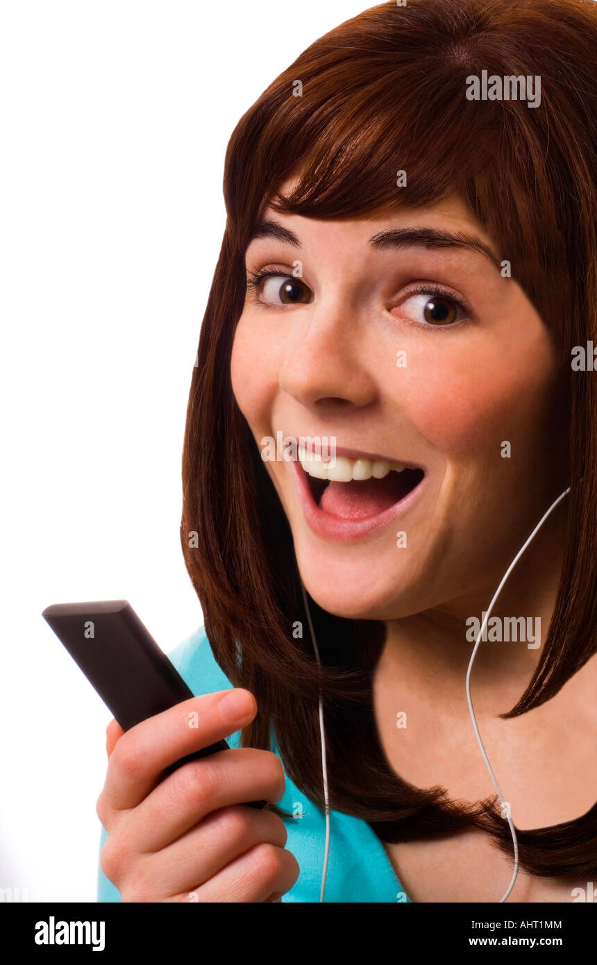 Woman listening to music player Stock Photo - Alamy