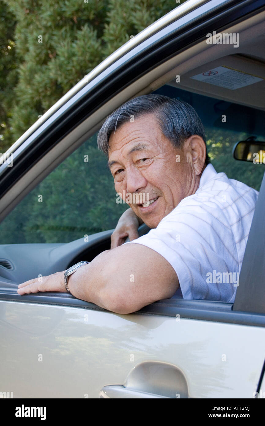 Senior asian man driving old hi-res stock photography and images - Alamy
