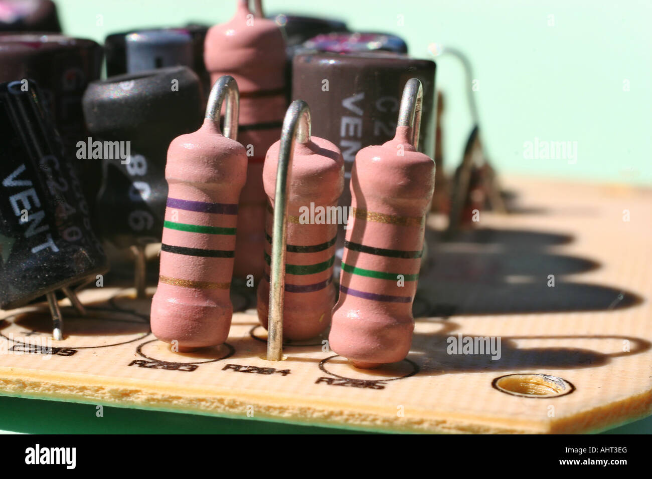 Very close view of group of resistors on an electronic circuit board ...