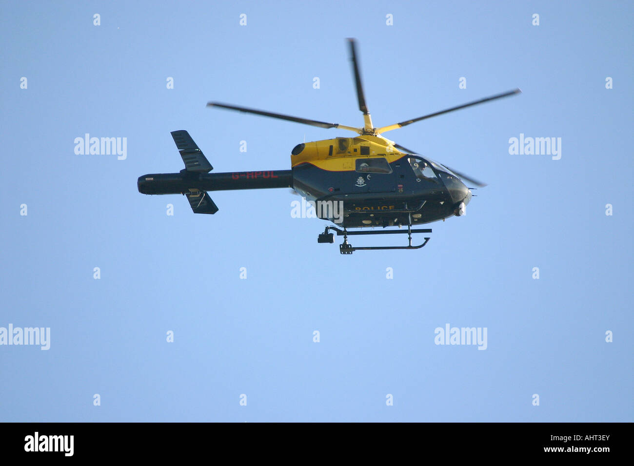 Police observation helicopter in action Stock Photo - Alamy