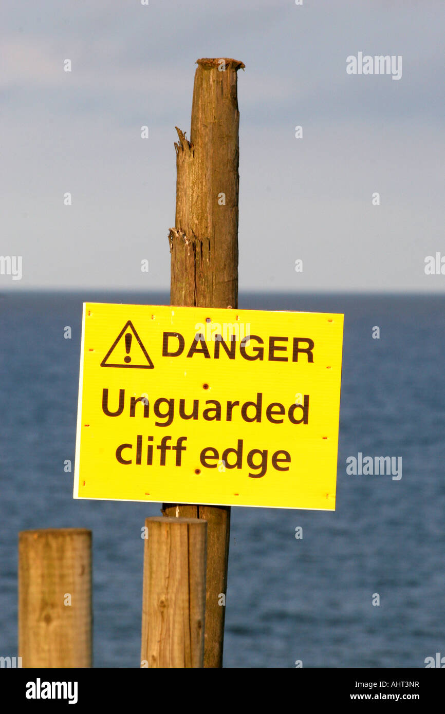 Danger sign on a soft clay cliffe top at Skipsea in North Yorkshire ...