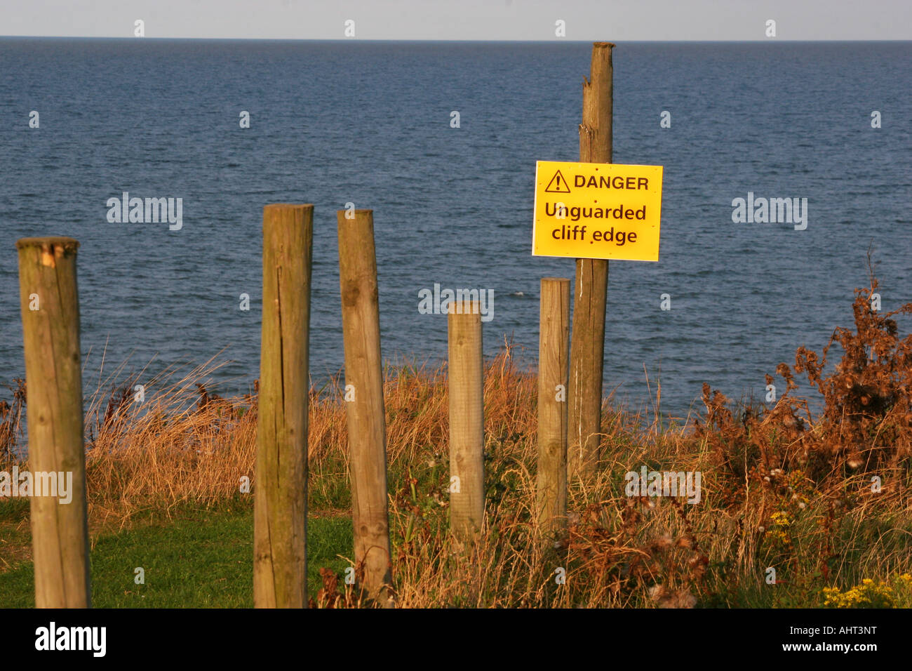 Danger sign on a soft clay cliffe top at Skipsea in North Yorkshire ...