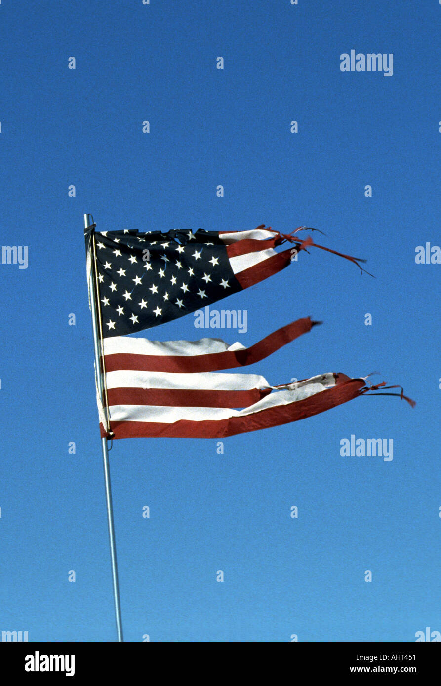 Ripped torn tattered american flag hi-res stock photography and images ...