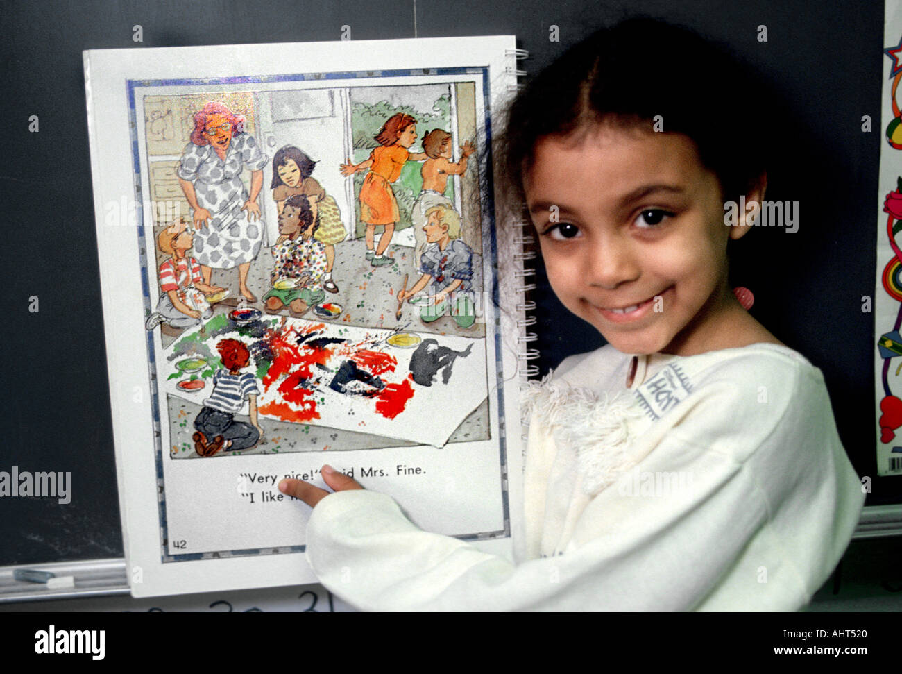 Black first grade female shows off parts of her reading lesson Stock ...