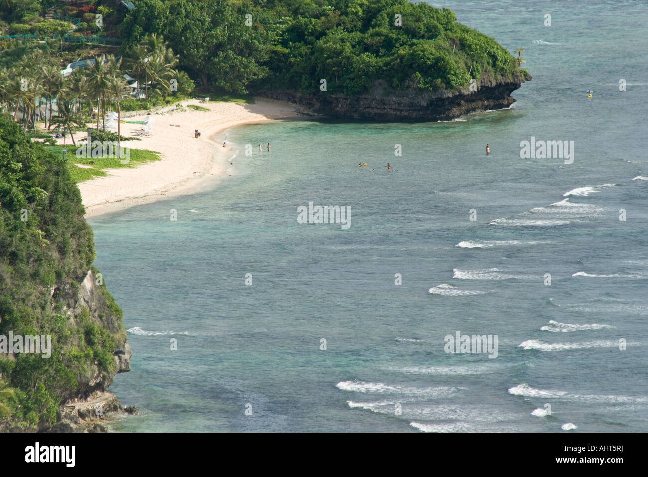 Coral Beach and Jungle Guam Stock Photo - Alamy