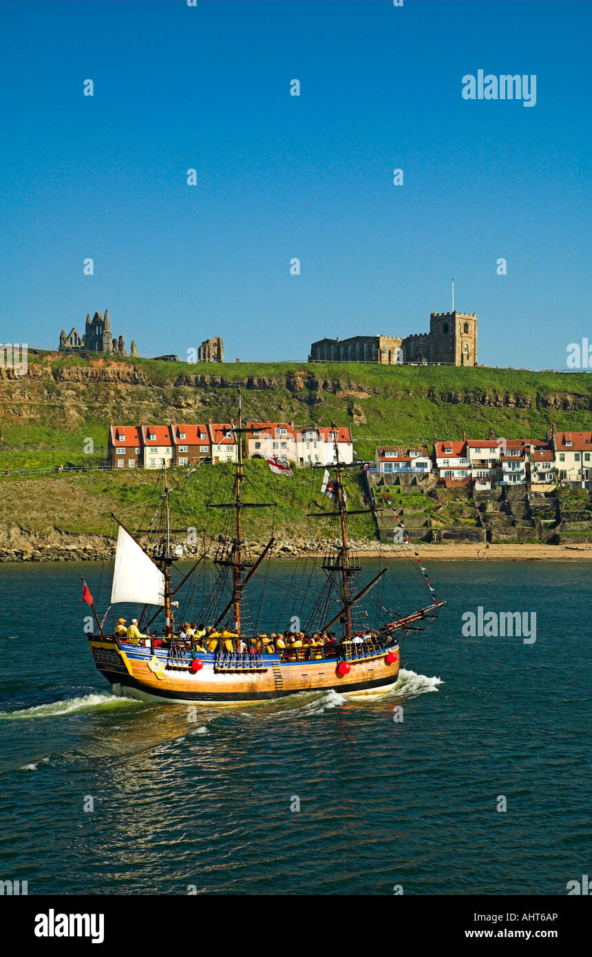 The Bark Endeavour replica sailing into Whitby harbour, North Yorkshire ...
