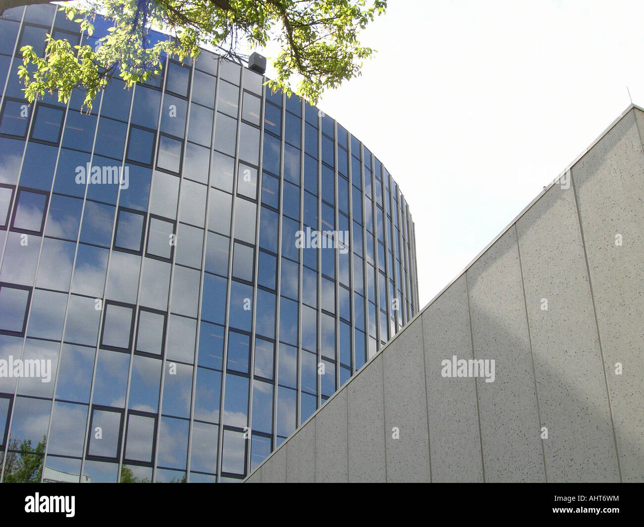 high rise office block with mirrored windows Stock Photo - Alamy