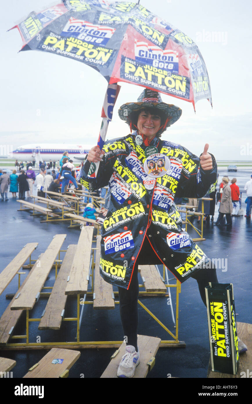 Woman shows off Clinton Gore stickers on her rainwear 1992 Stock Photo ...