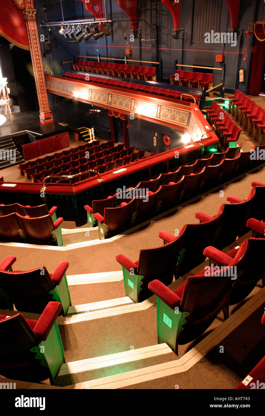 Interior of a theatre showing the seats and balcony Stock Photo - Alamy