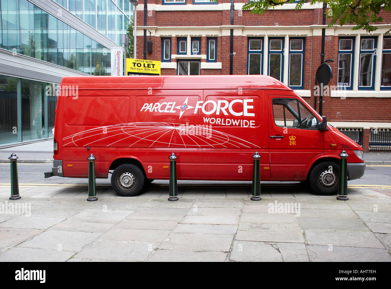 parcel force / royal mail van making a delivery / collection in ...