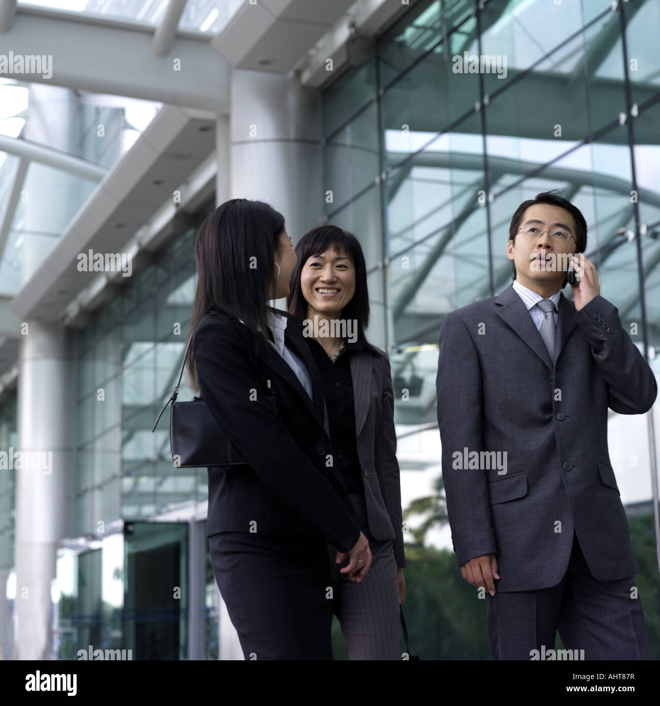Business people walking and talking Stock Photo - Alamy