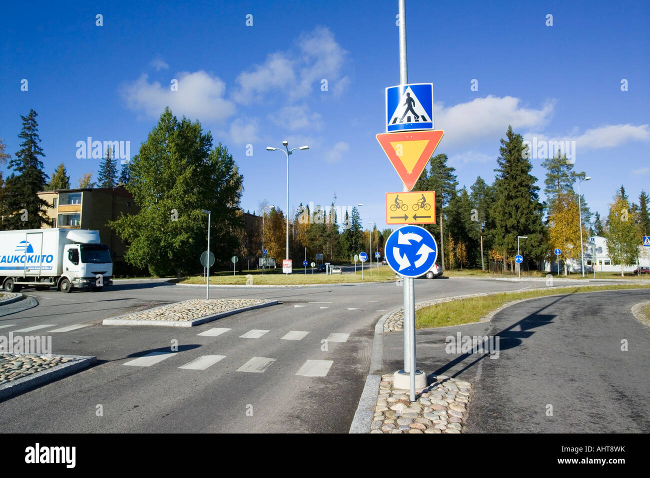 compulsory roundabout traffic sign Stock Photo - Alamy